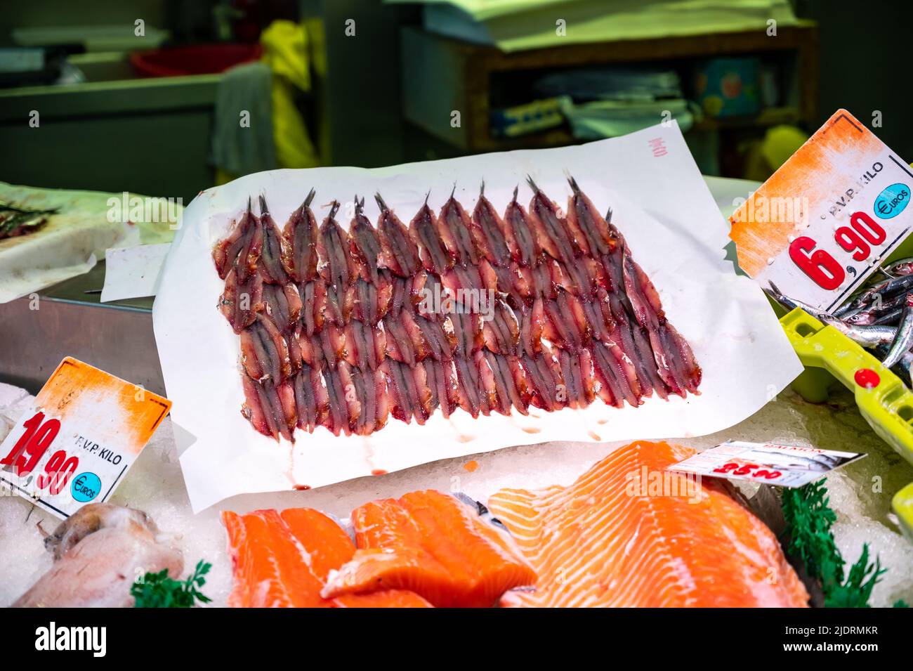 Fillets of fresh small salted anchovies fish on fish market in Bilbao ...
