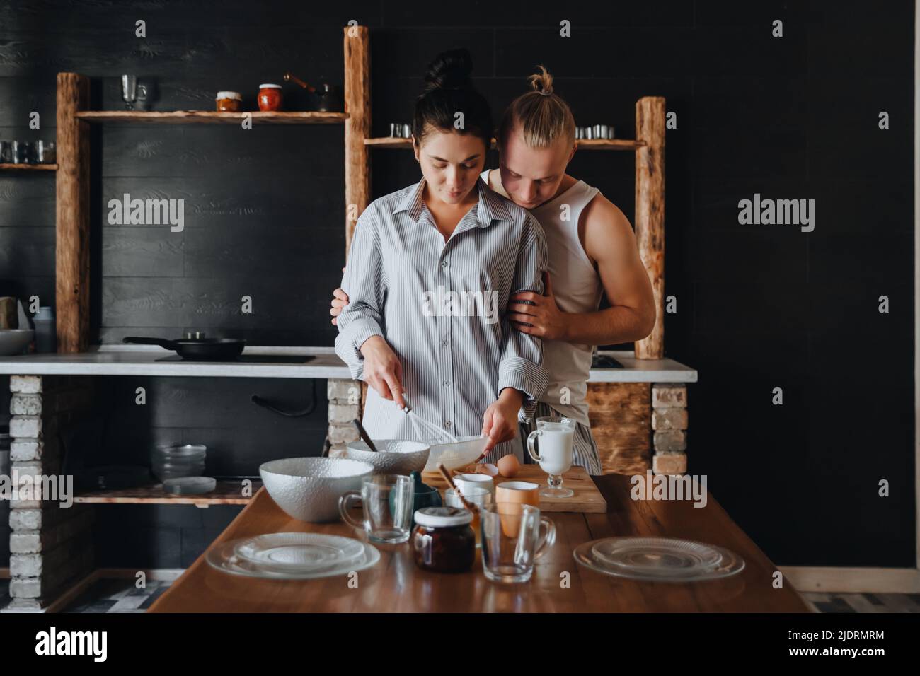 Young couple in love cook healthy food in the kitchen together Stock ...