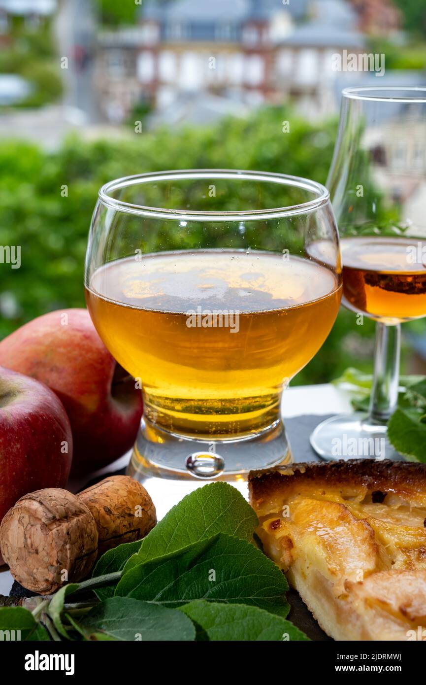 Apple products of Normandy region, homemade baked apple cake, glasses ...