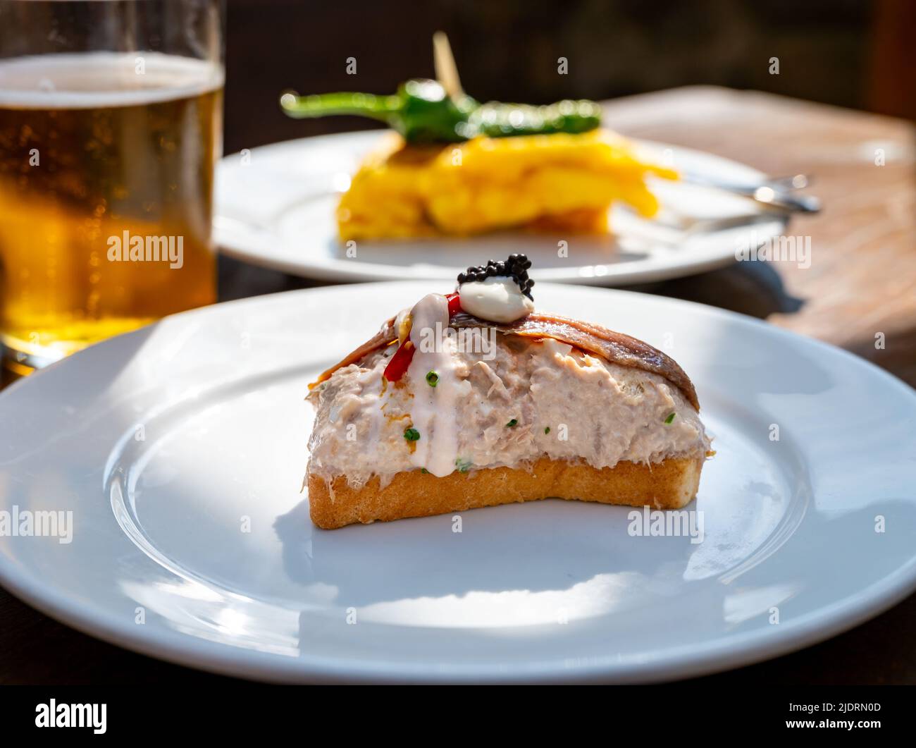 Sunny day in San Sebastián gastronomic city, typical food and drink in ...