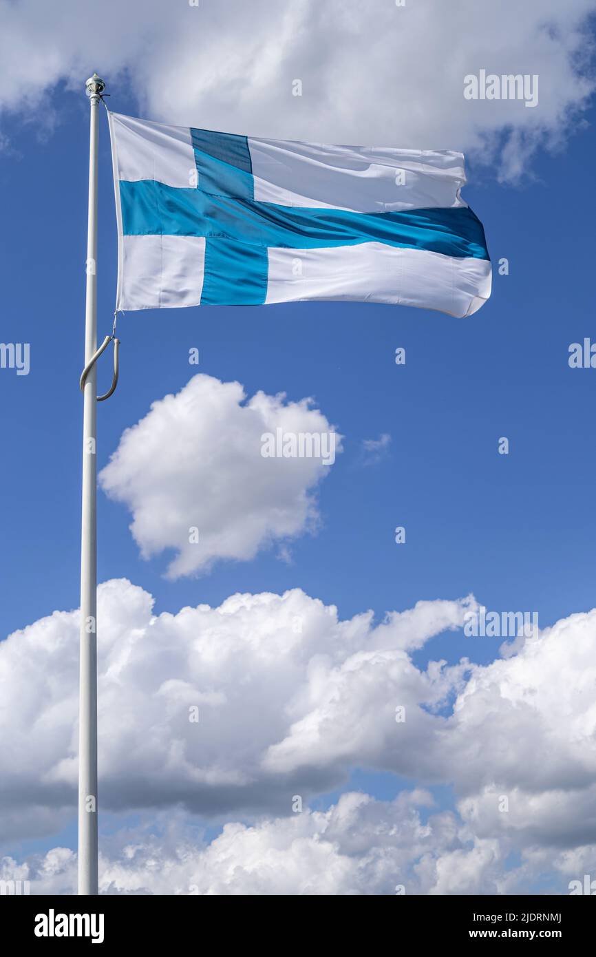 flag of Finland flying in the wind Stock Photo - Alamy