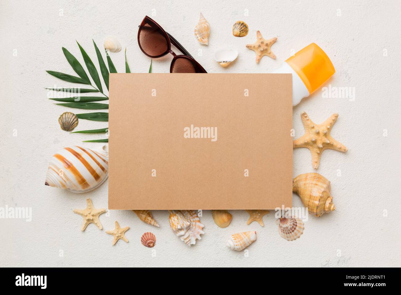 Summer time concept with blank greeting card and blank craft paper on ...