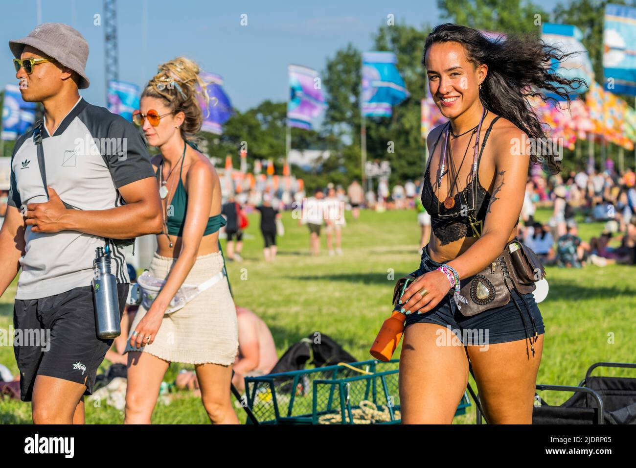 Pilton, UK. 22nd June, 2022. As the sun begins to go down on the first day, many are still ...