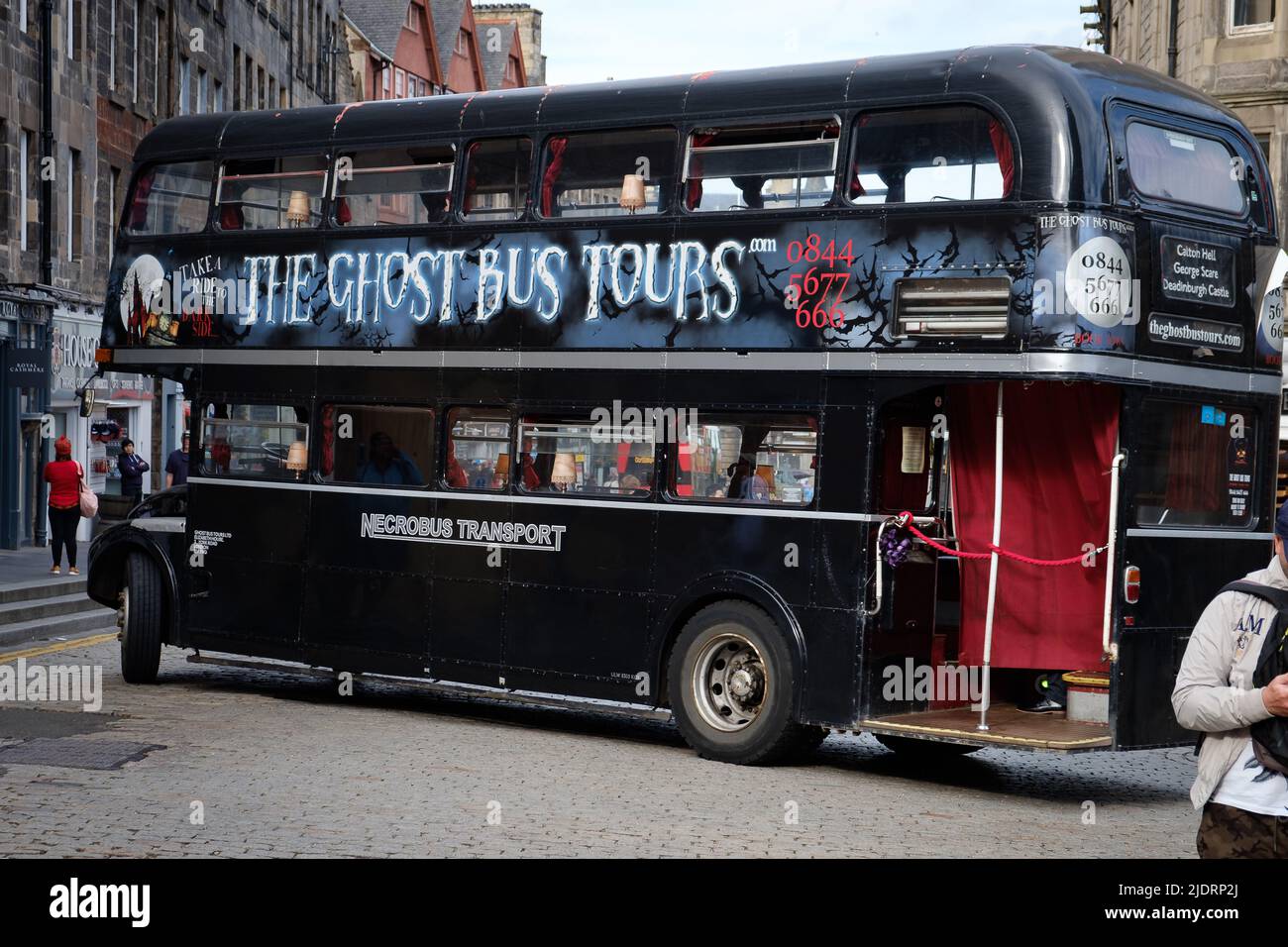 The ghost bus tours bus on the Royal Mile in Edinburgh Stock Photo - Alamy