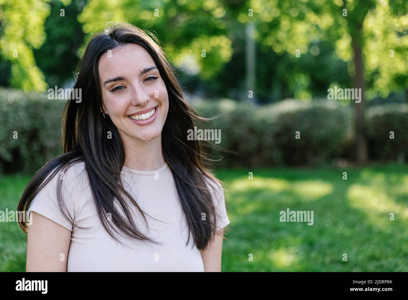 Happy woman posing for the camera hi-res stock photography and images - Alamy