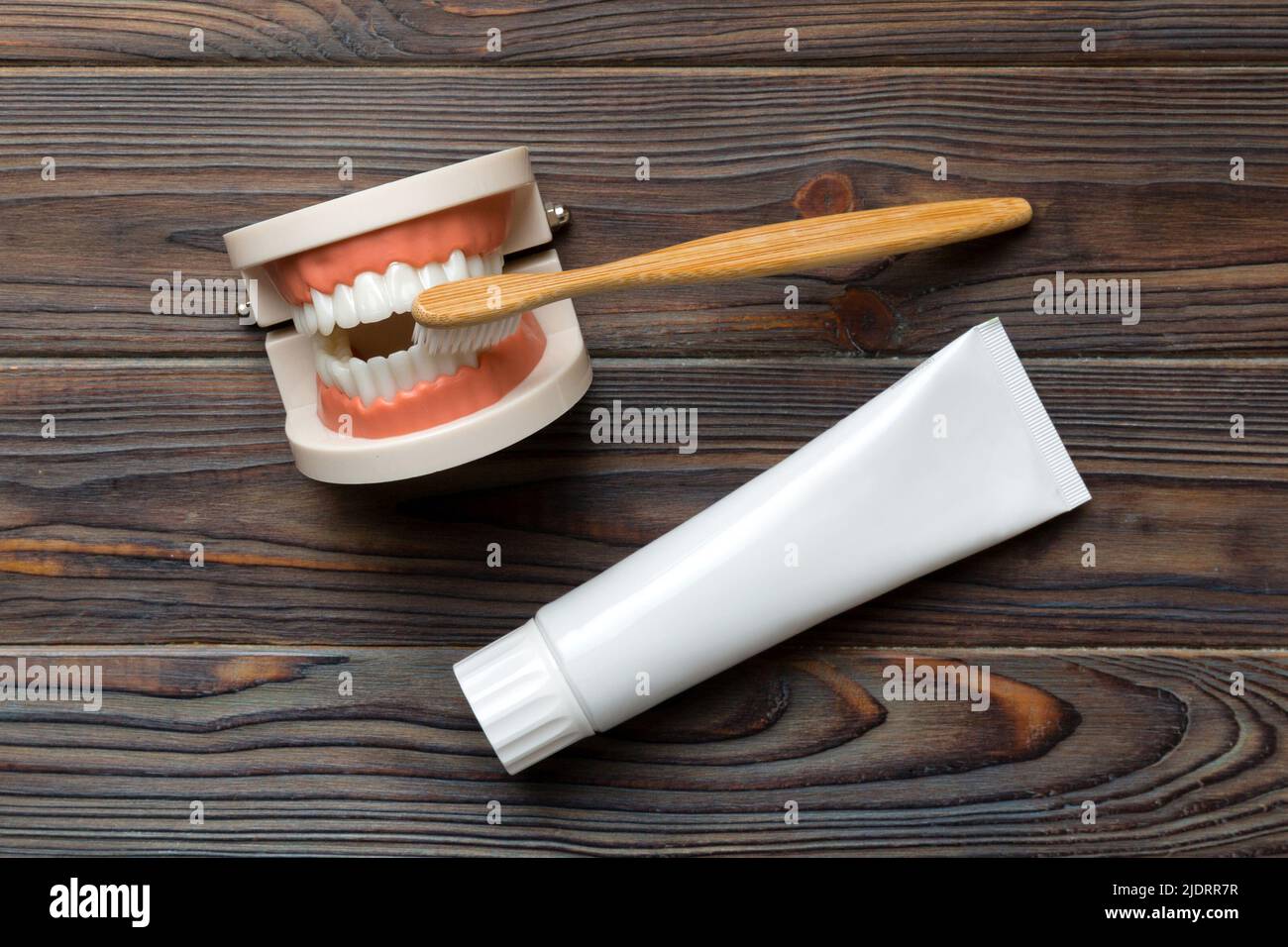 Mouthwash and other oral hygiene products on colored table top view ...