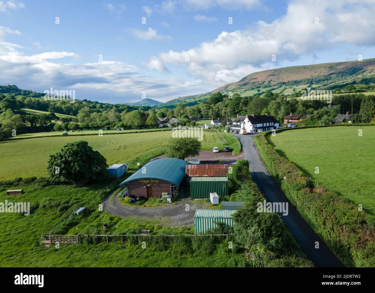 Aerial view of a rural English village shop in Herefordshire on the ...