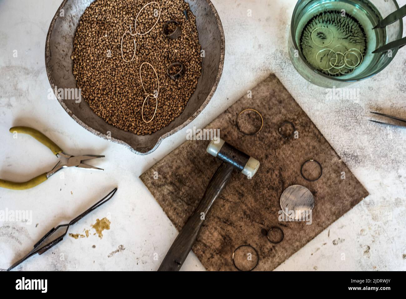 Top view jewelry maker workbench with tools on table. Equipment and ...