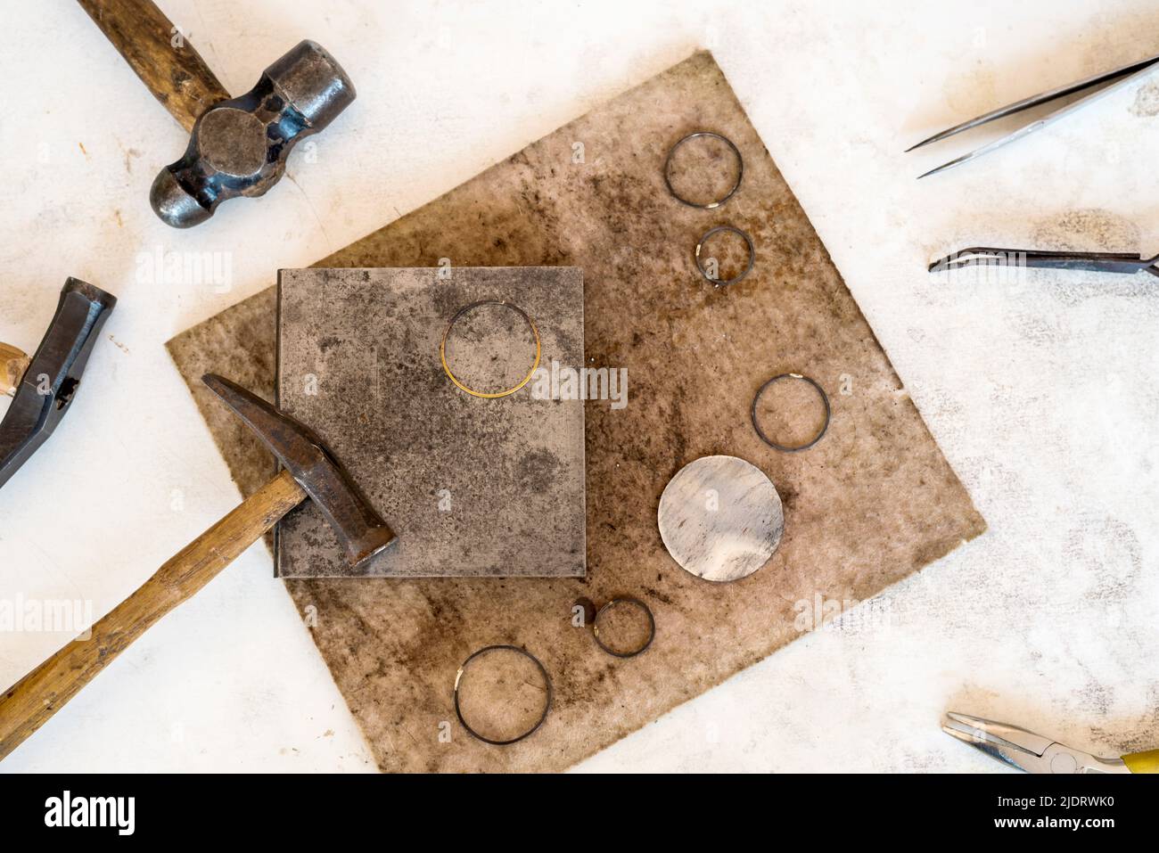 Top view jewelry maker workbench with tools on table. Equipment and ...