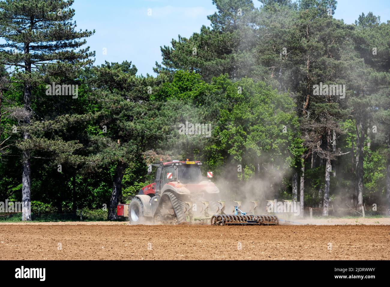 Case 380 tractor with plough Hollesely Suffolk England Stock Photo - Alamy