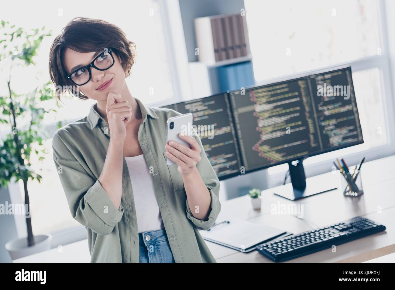 Portrait of smart minded pc expert hand chin brainstorming hold ...