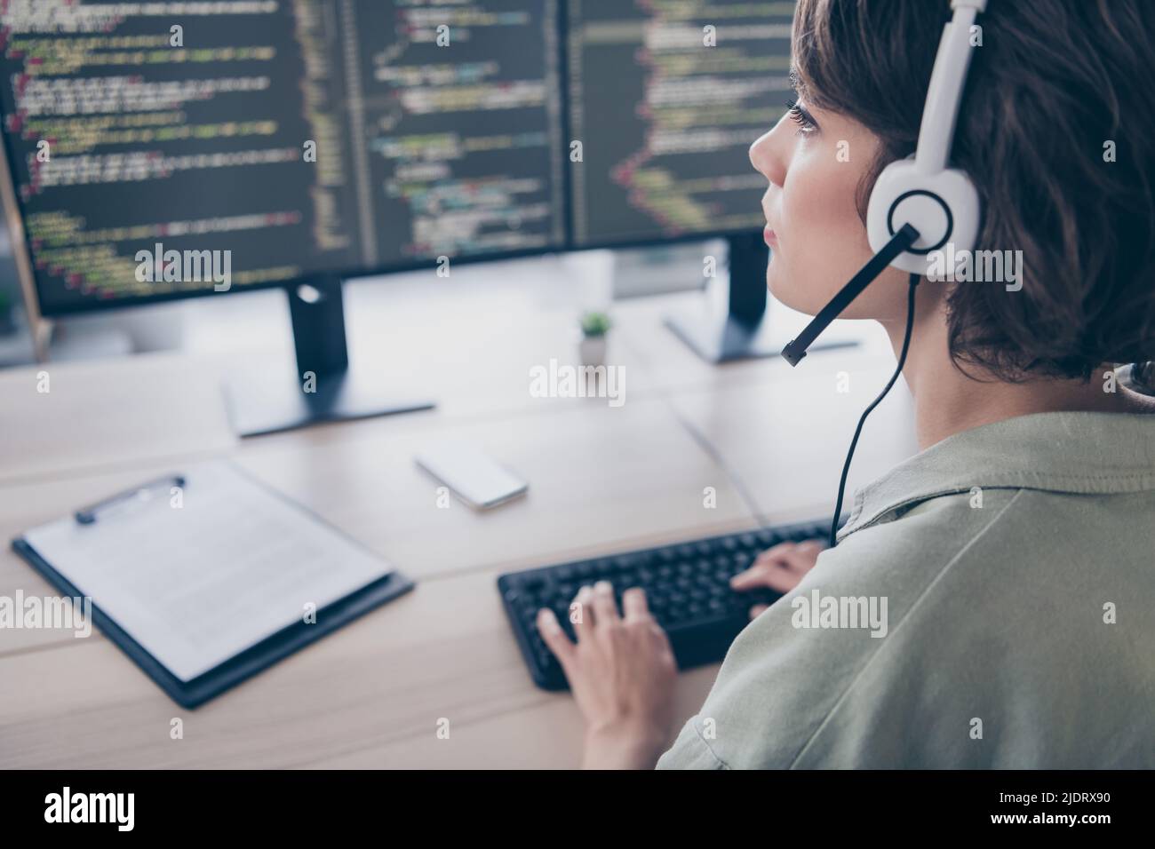 Profile side view portrait of attractive confident girl coding writing ...