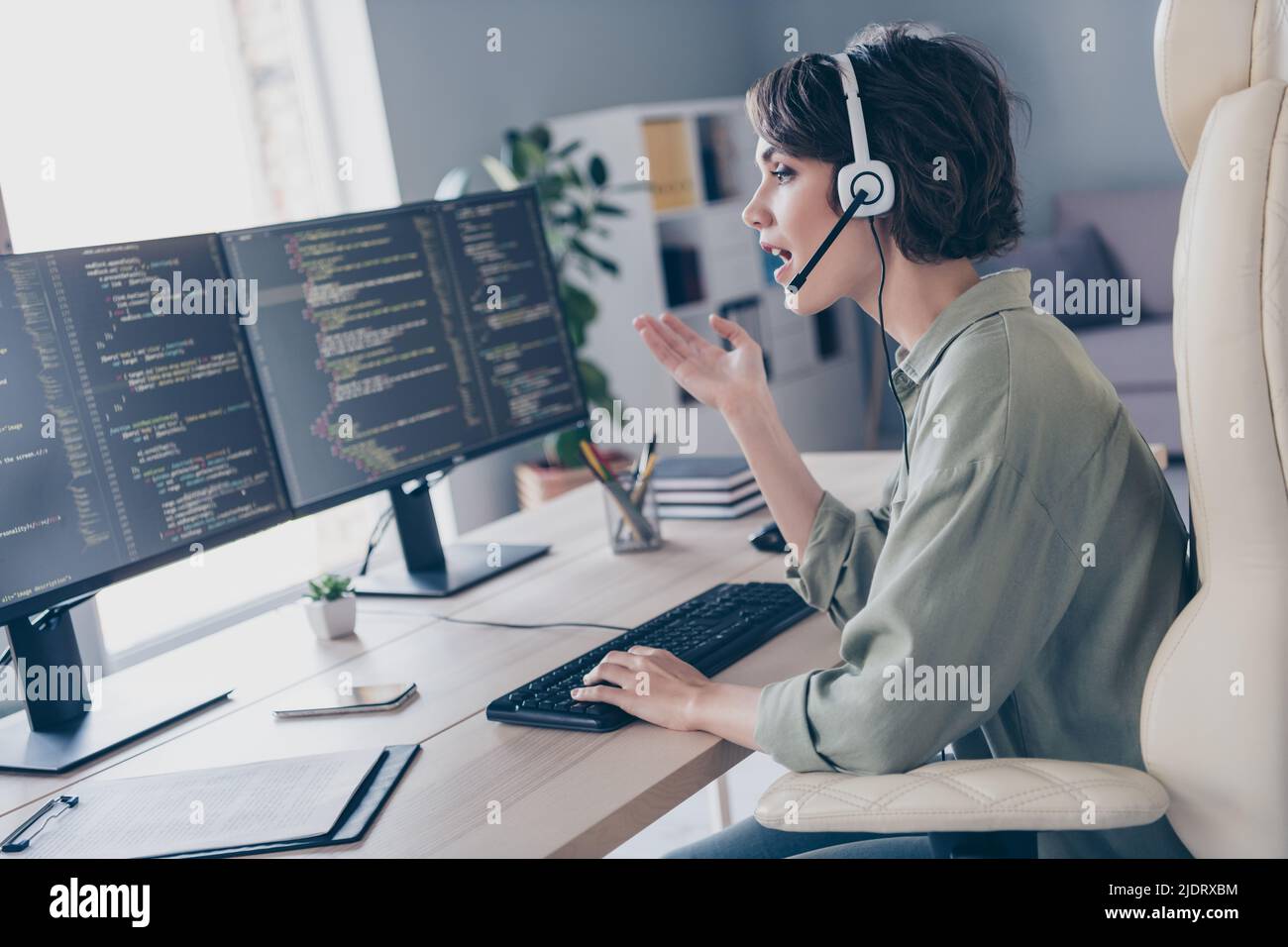 Profile photo of skilled pc expert sitting chair speak communicate ...