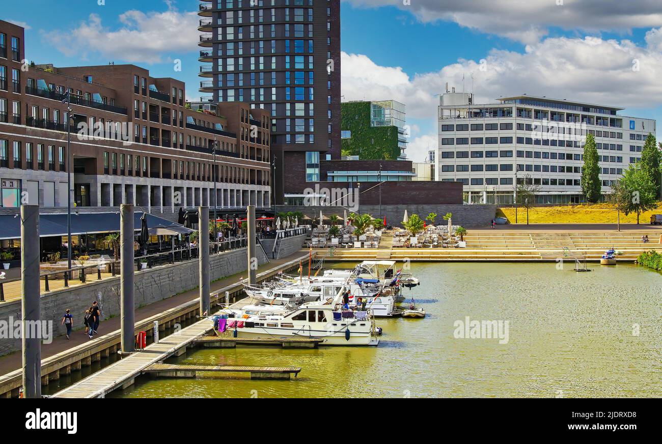 View on dutch city inland yacht harbor, modern architecture buildings ...