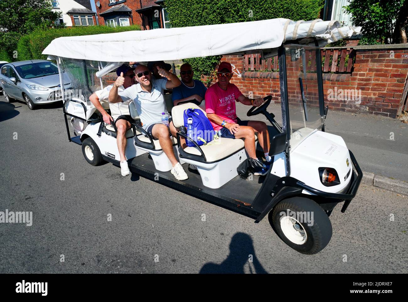 A member of Yorkshire County Cricket Club staff transports fans to the ...