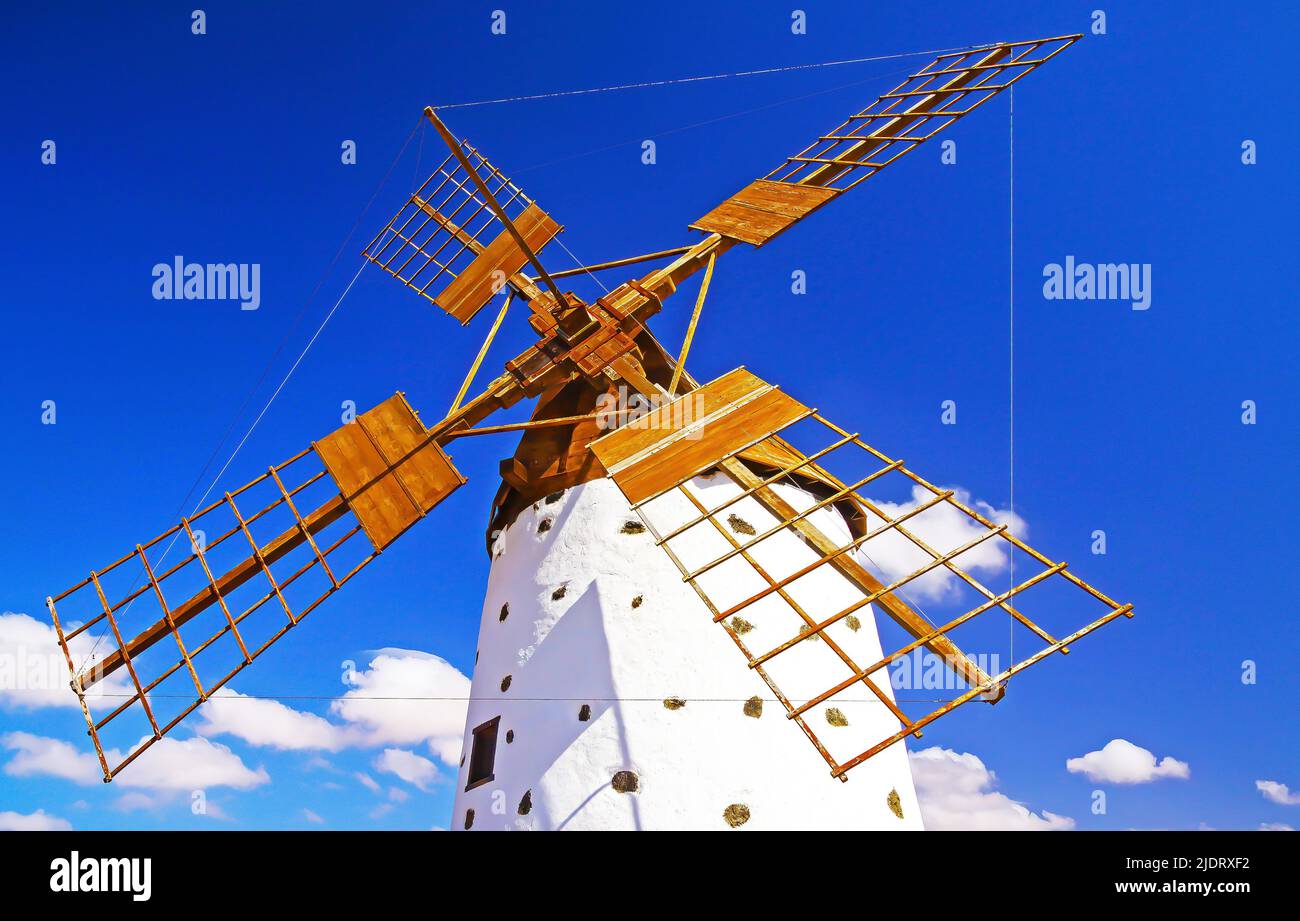 One beautiful spanish isolated ancient white traditional stone windmill ...