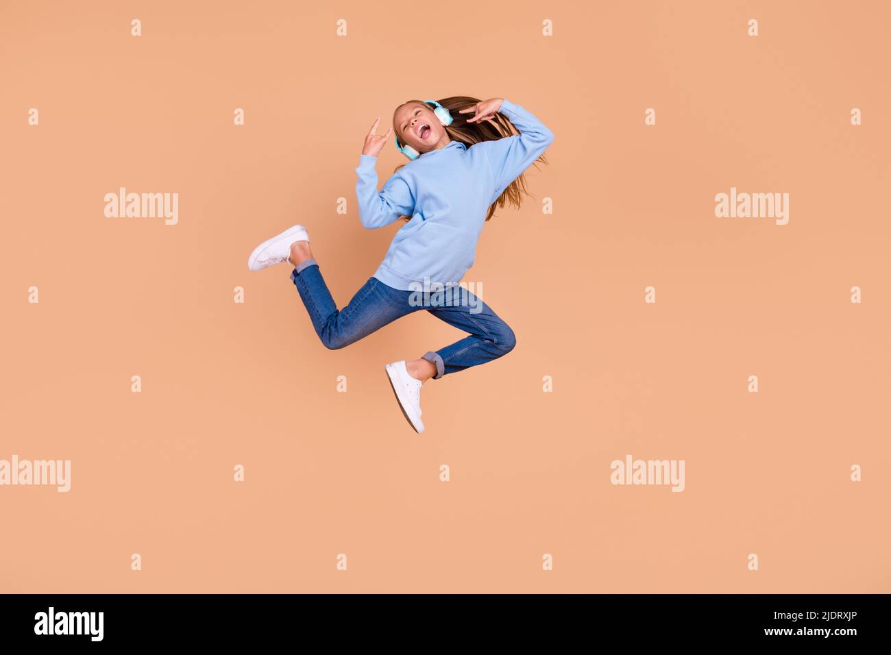 Full length portrait of childish carefree person jump hands fingers ...