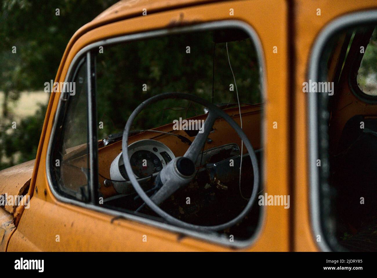 An old rusty orange fiat Stock Photo - Alamy