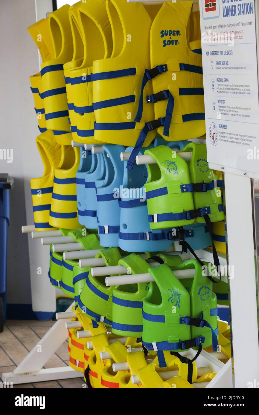 yellow safety lifejacket for the kids by swimming pool on cruise ship ...