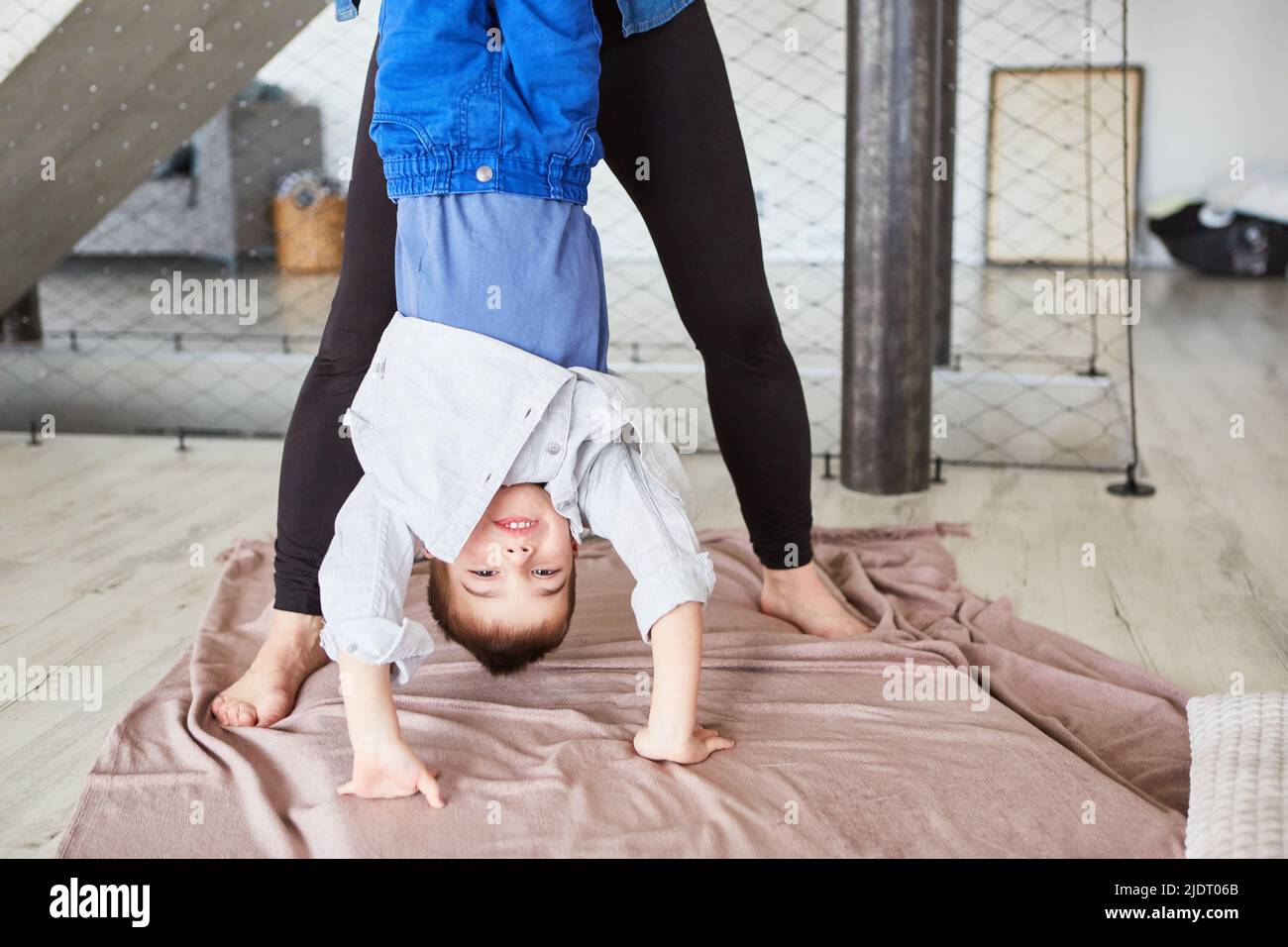 Boy handstand gymnastics hi-res stock photography and images - Alamy