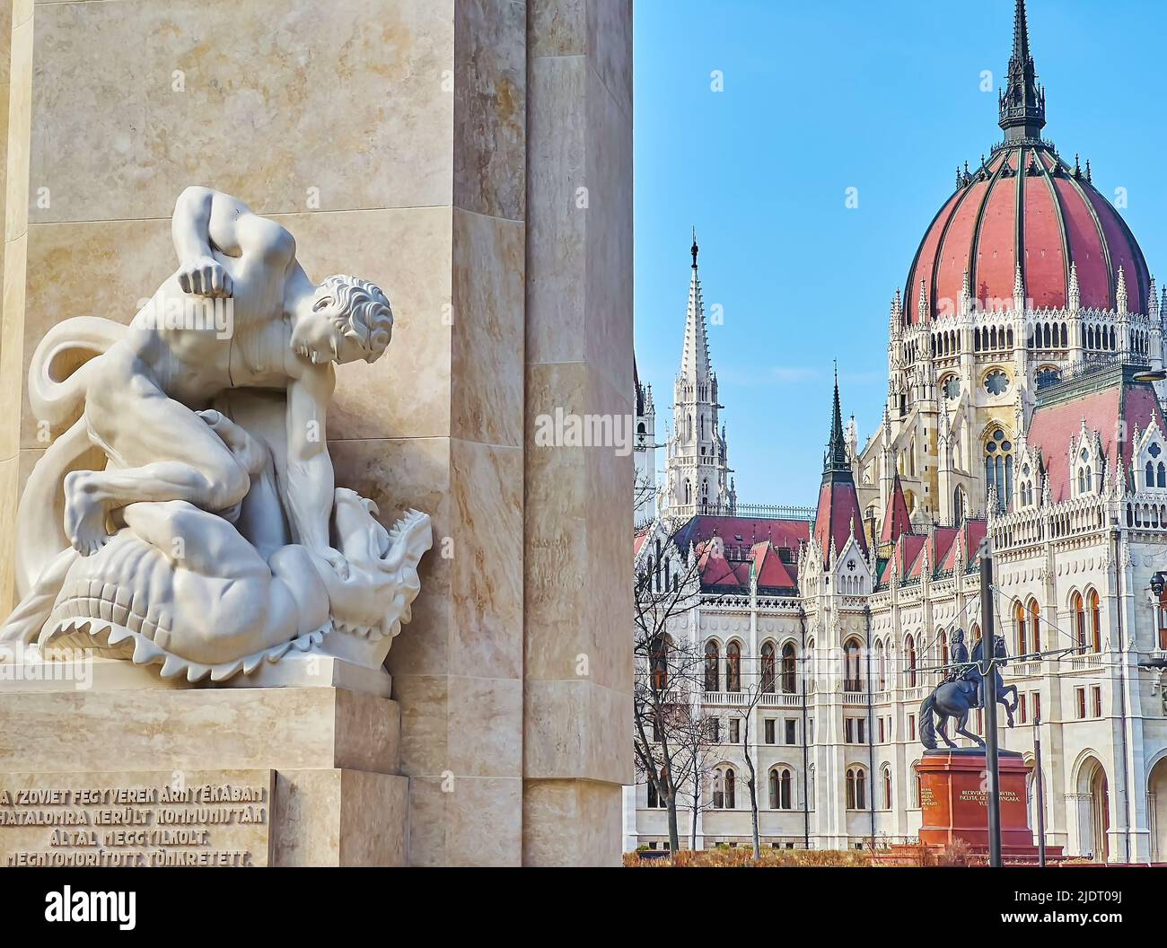 The sculpture of man killing dragon of National Martyrs Monument (Red ...