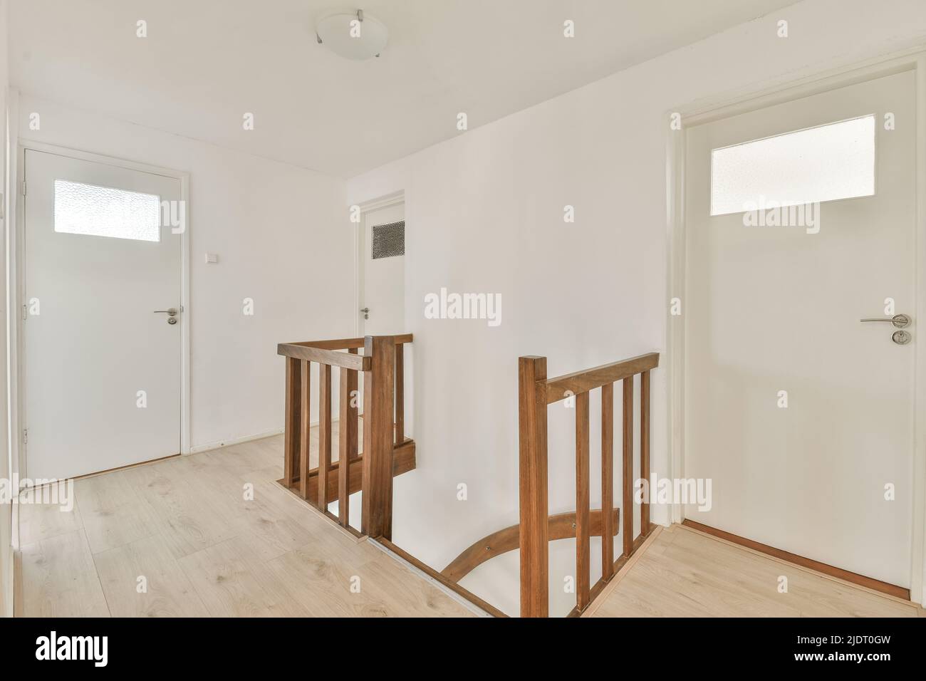 Spacious wooden stairway with comfortable steps Stock Photo - Alamy