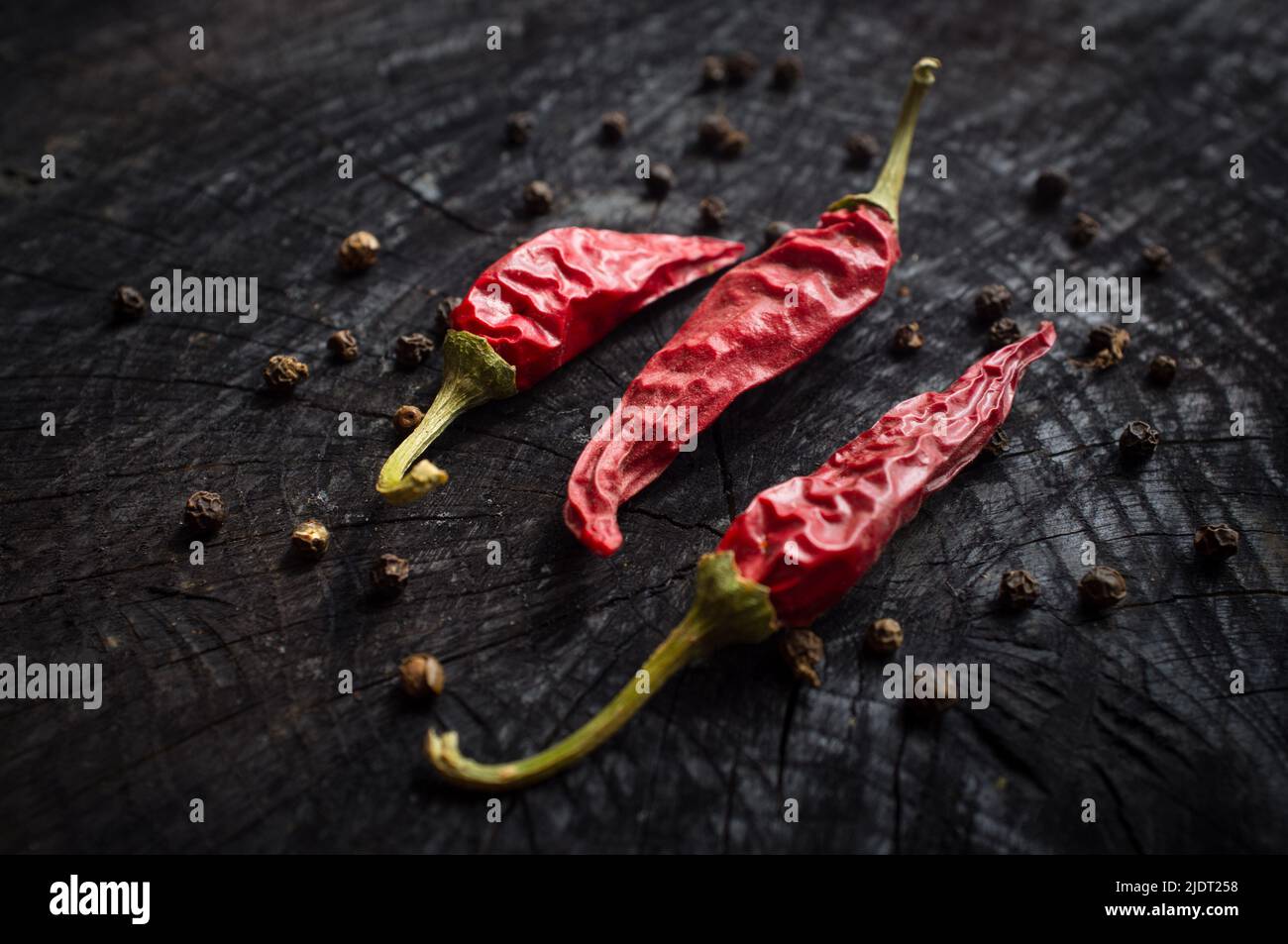 hot red pepper and black pepper Stock Photo - Alamy