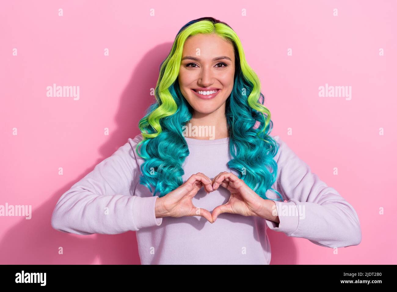 Photo of young thankful grateful female showing heart symbol express ...