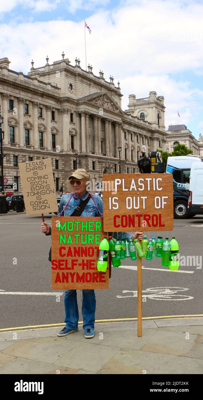 A protestor standing on the corner of Parliament Square London England ...