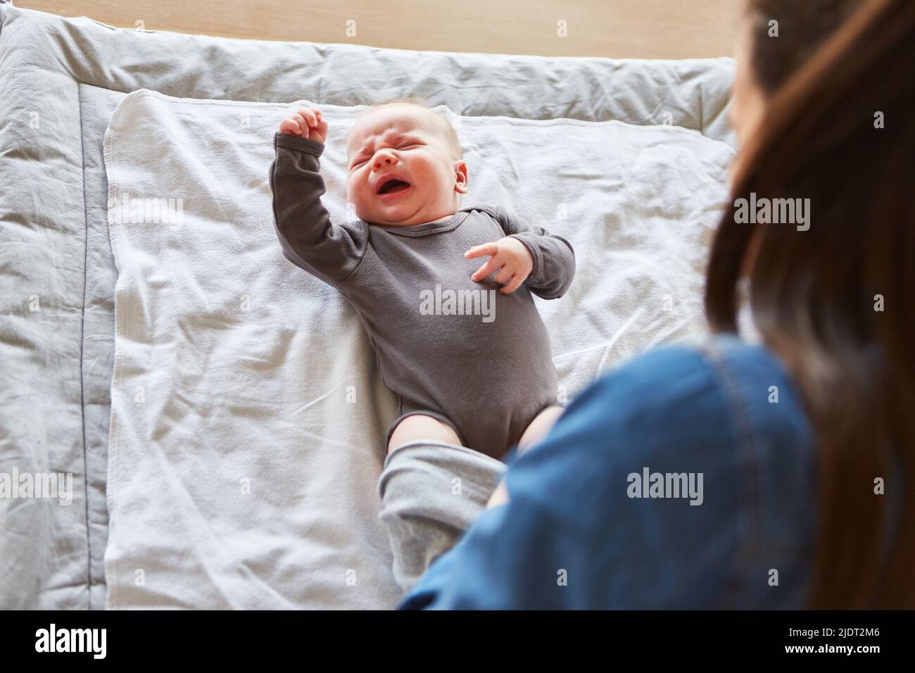 Baby mother change clothes diaper hi-res stock photography and images ...