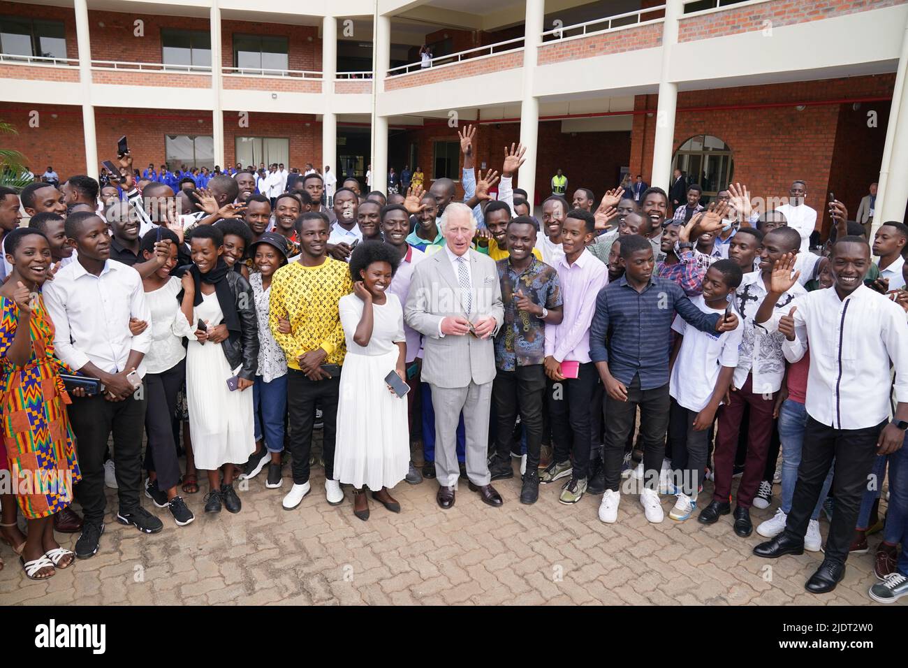 The Prince of Wales with students during a visit to the Integrated ...