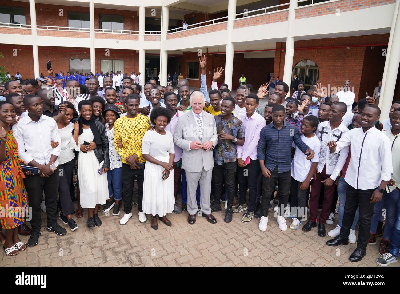 The Prince of Wales with students during a visit to the Integrated ...