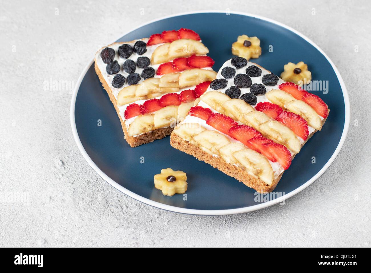 American flag sandwiches with fruit and cream cheese on rye bread on ...