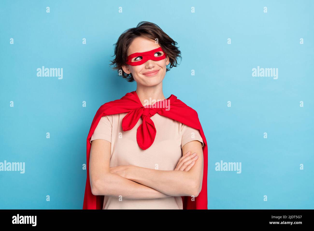 Photo of sweet confident lady dressed red mantle arms crossed looking ...