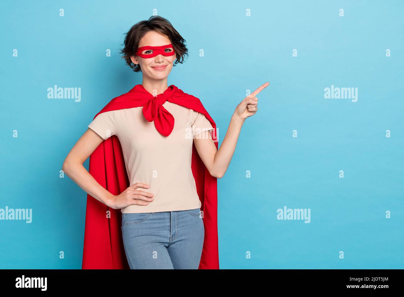 Photo of pretty sweet lady dressed red mantle pointing finger empty ...