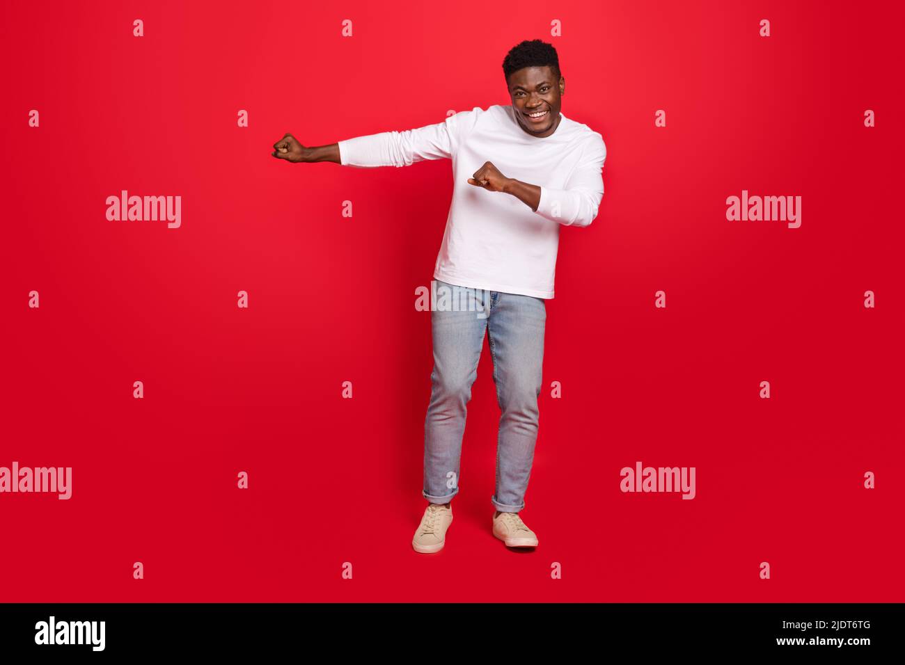 Full body photo of cheerful active overjoyed male have fun in nightclub ...