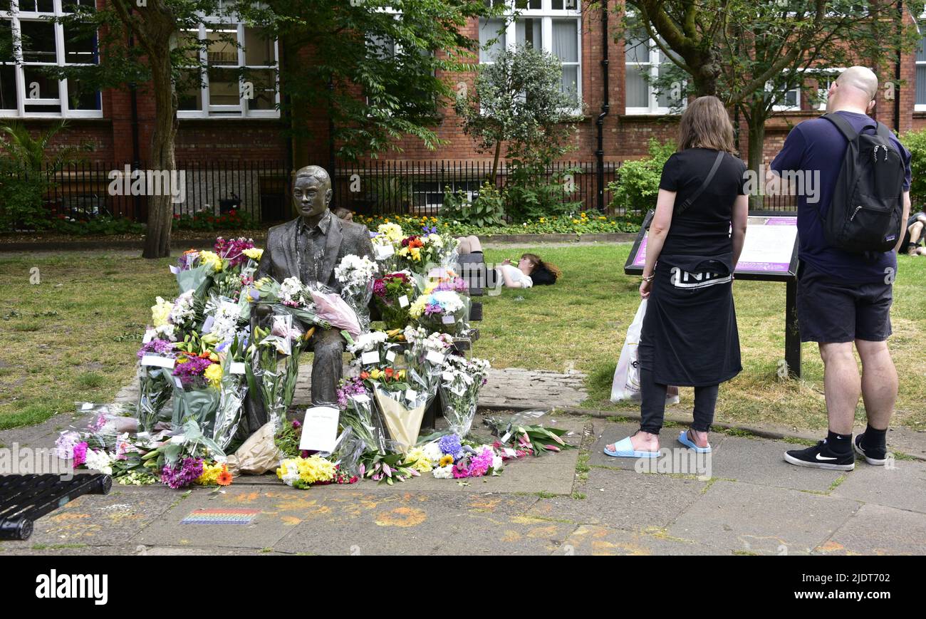 Manchester, UK. 23rd June, 2022. Bunches of flowers left at the Alan ...