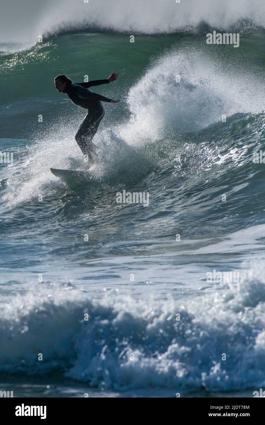 Surfing action and big waves at Fistral in Newquay in Cornwall in the ...