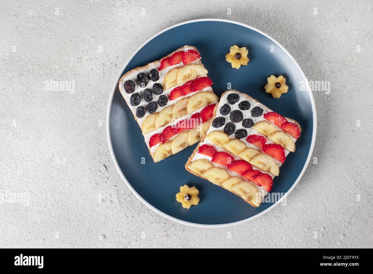 American flag sandwiches with fruit and cream cheese on rye bread on ...