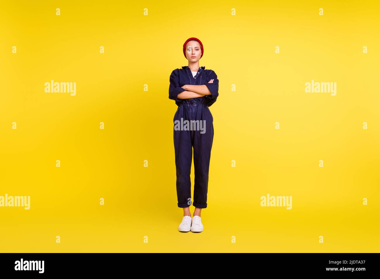 Full length body size view of attractive serious content girl folded ...