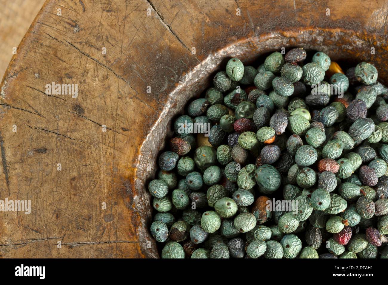 Fruits of Terebinth, Pistacia terebinthus. Antique mortar Stock Photo ...