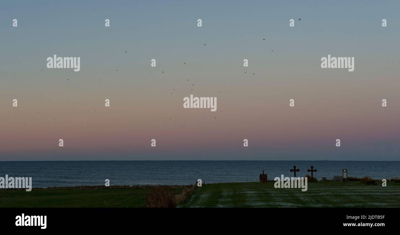 Varhaug old graveyard and chapel located at the brink of the North Sea ...