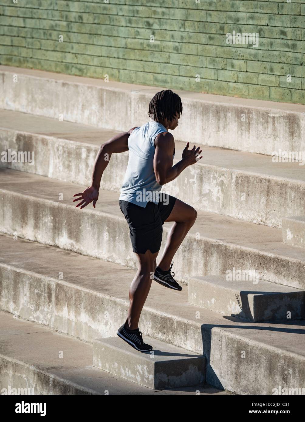 Jogging up steps hi-res stock photography and images - Alamy