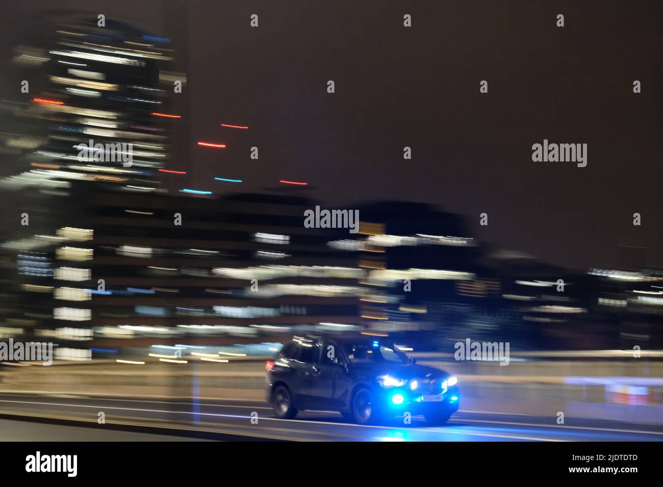 Police car speeding across London Bridge Stock Photo - Alamy
