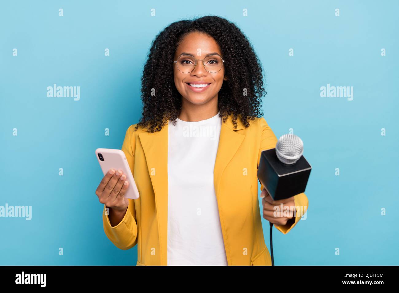 Photo of young african woman use smartphone journalist news interview ...