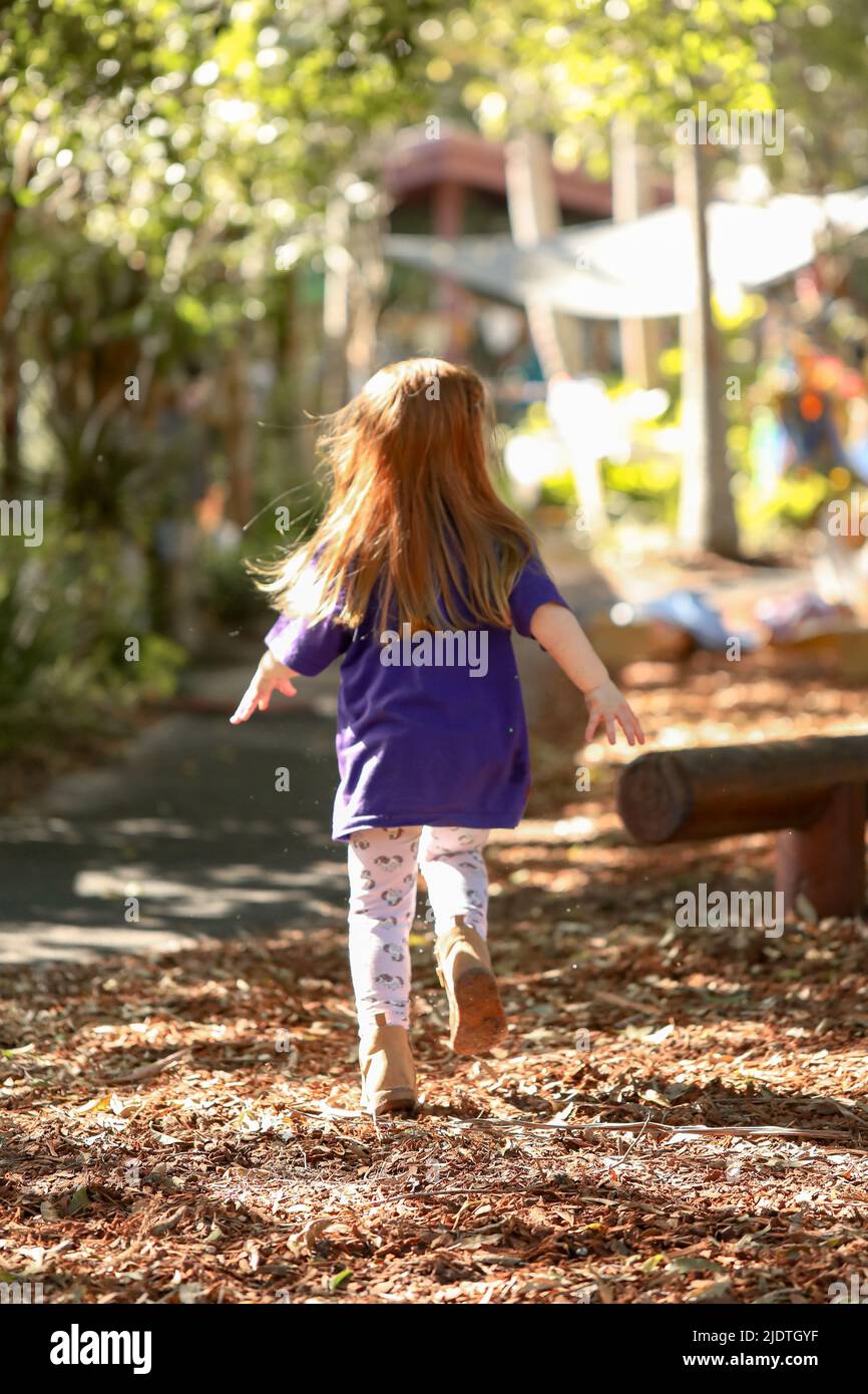Kindergarten girl running hi-res stock photography and images - Alamy
