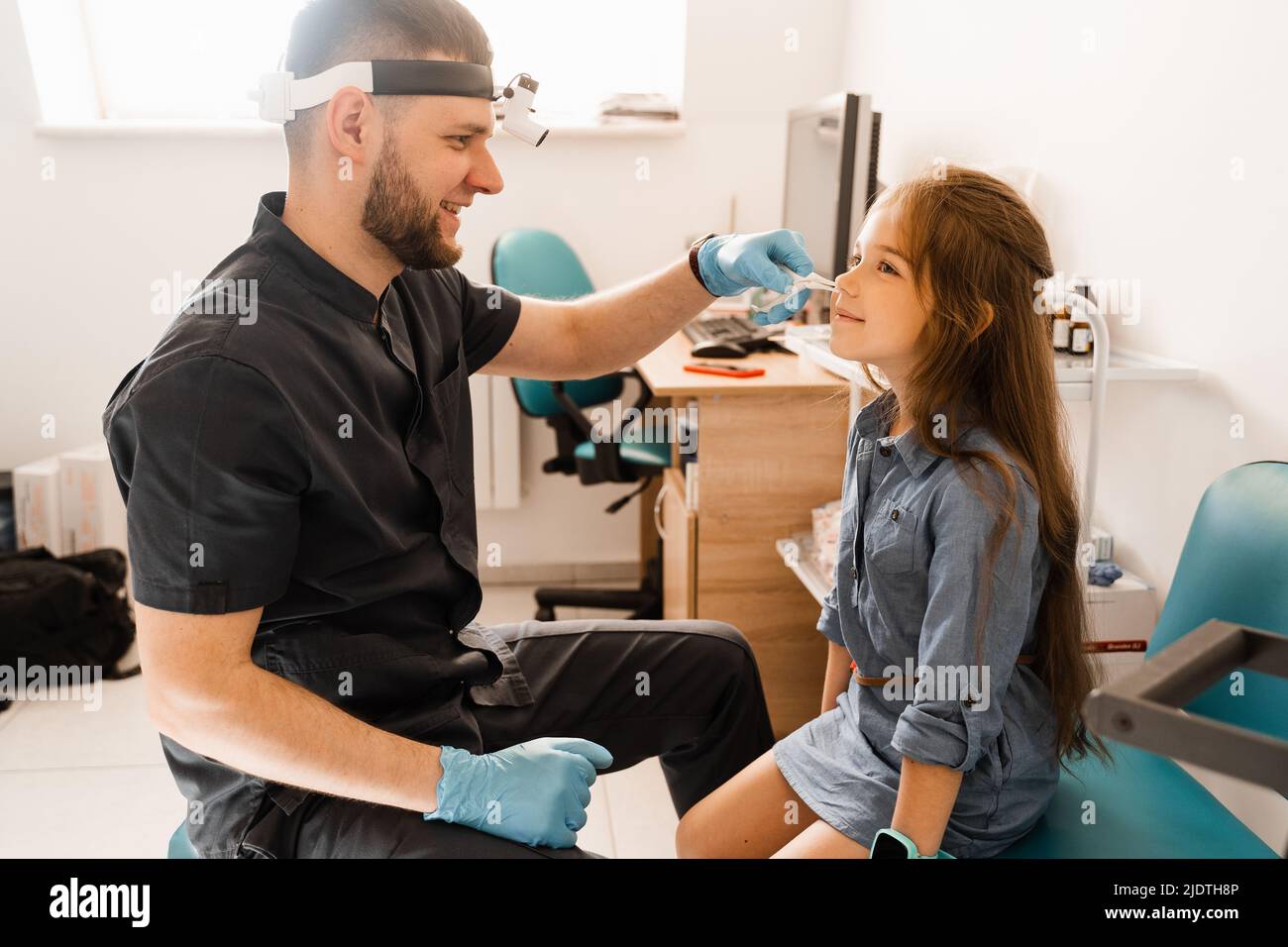Rhinoscopy of child nose. Consultation with doctor. Children ...