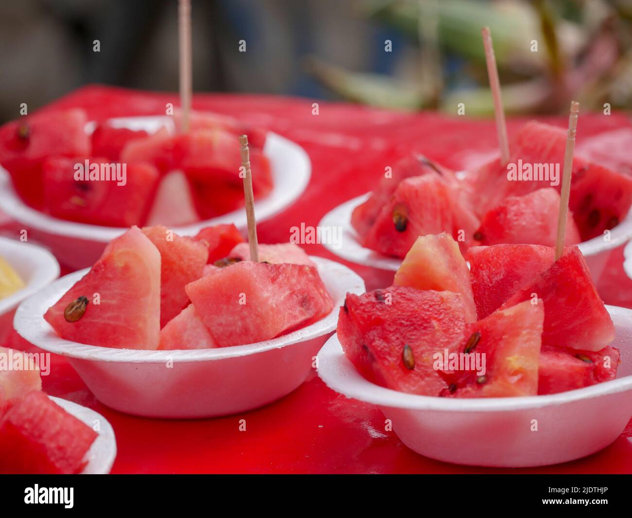 Close up sliced red watermelon cubes pieces in plastic cup Stock Photo ...