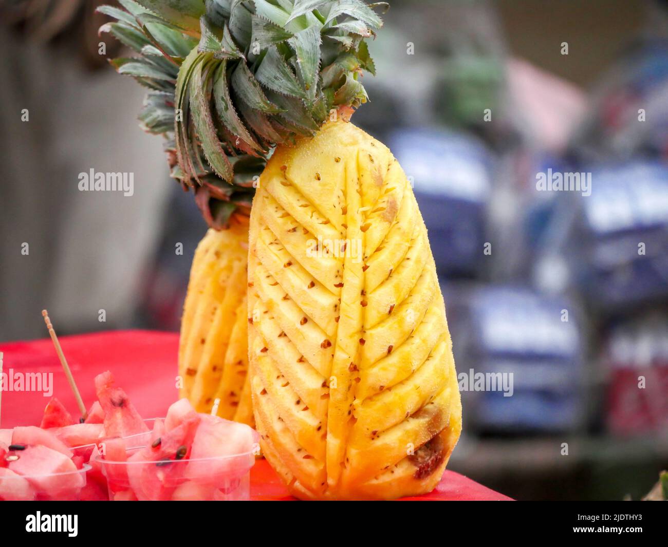 Fresh pineapple Pieces, ready to be sold in a Indian local market Stock ...