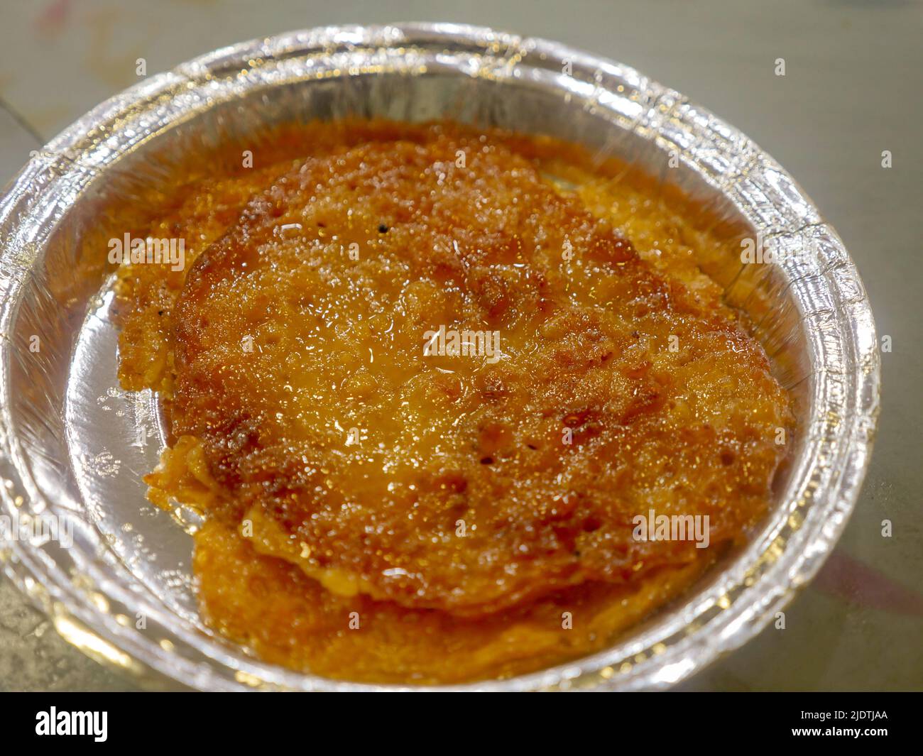 Malpua - Traditional Indian sweet pancake coated in sugar syrup made ...